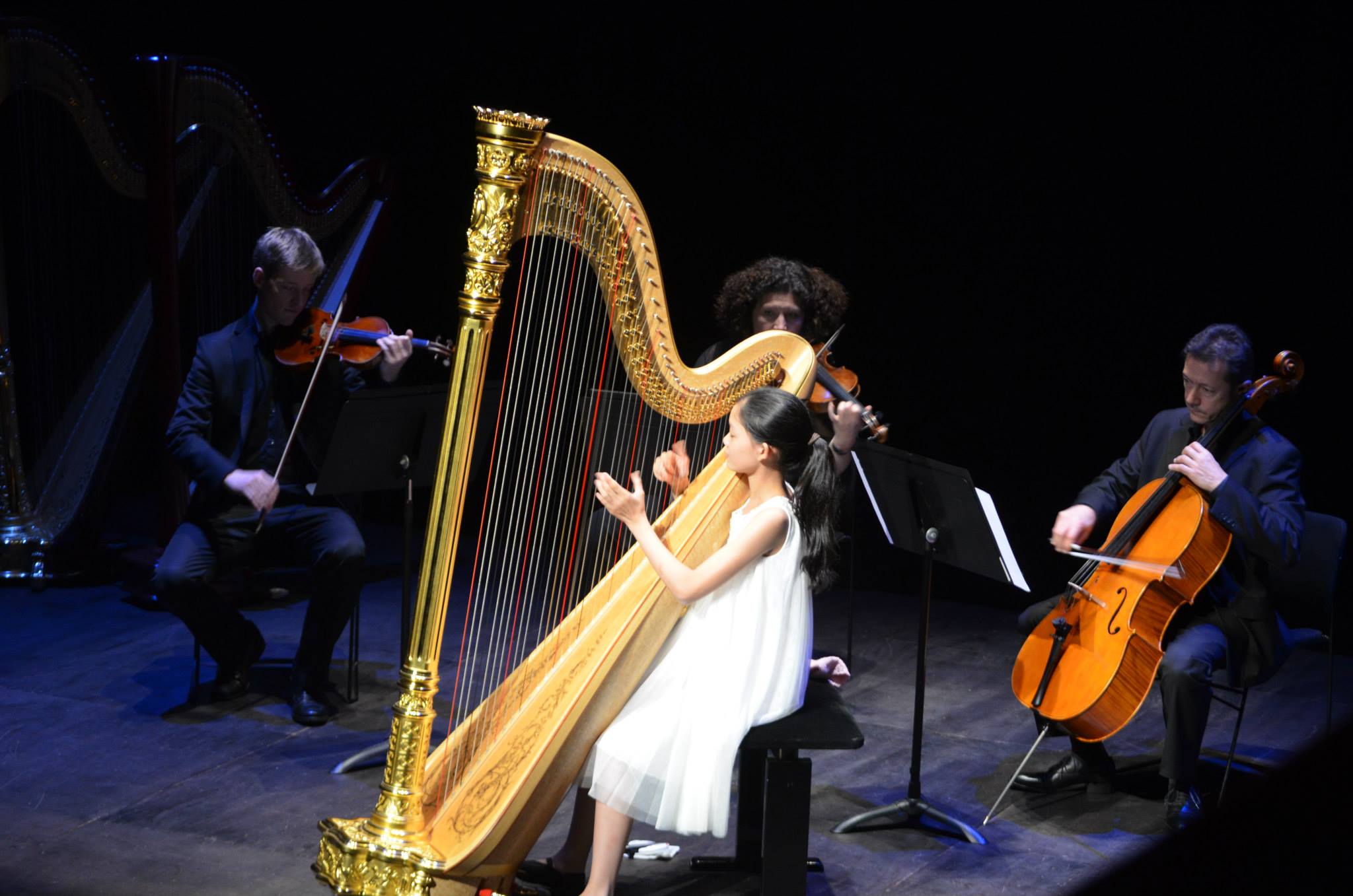 HyeJin Kim performs with orchestra at the 2014 Lily Laskine Competition ...