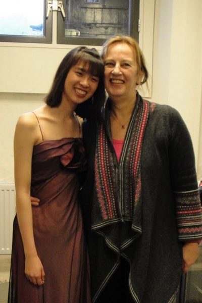 Wan Wins Gold | Harp Column